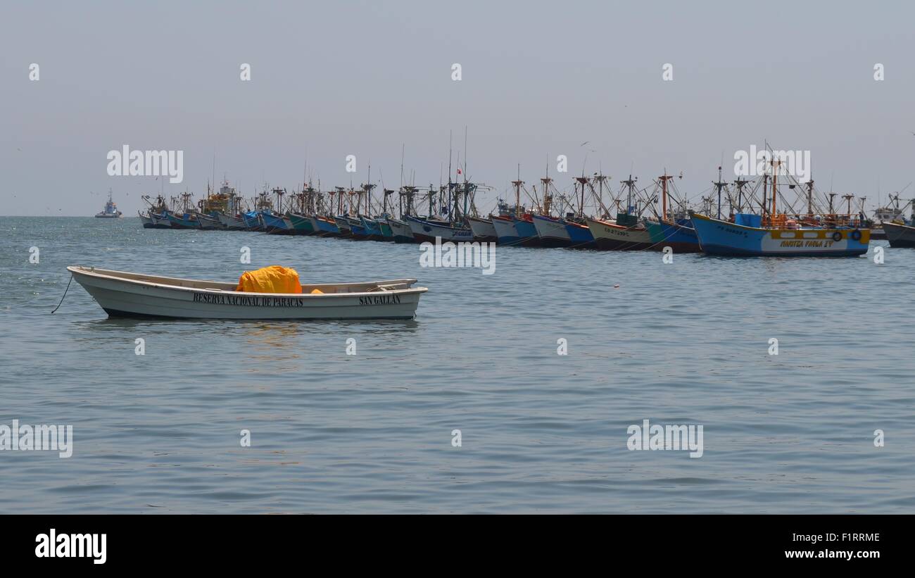 Fishing boats and Pelicans in the harbour of Paracas. Ica, Peru Stock ...