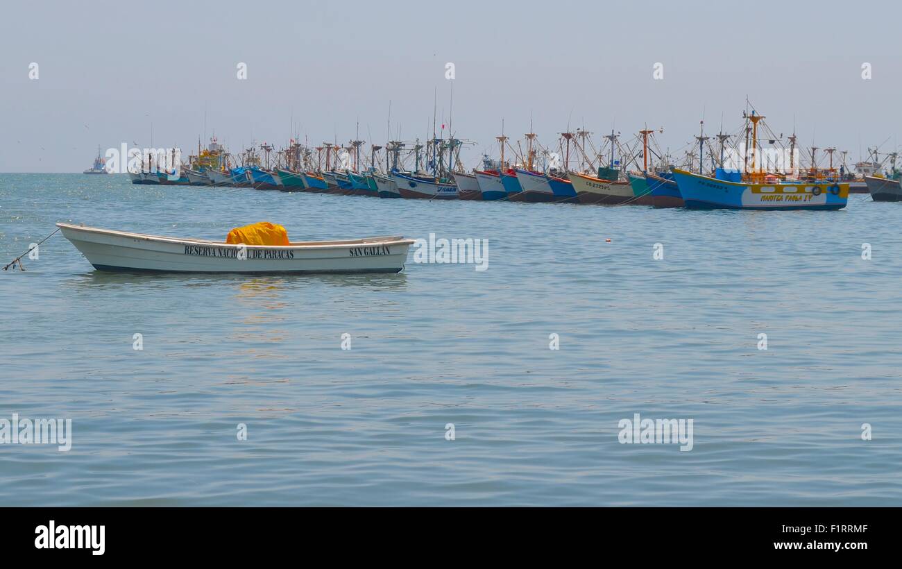 Fishing boats and Pelicans in the harbour of Paracas. Ica, Peru Stock ...