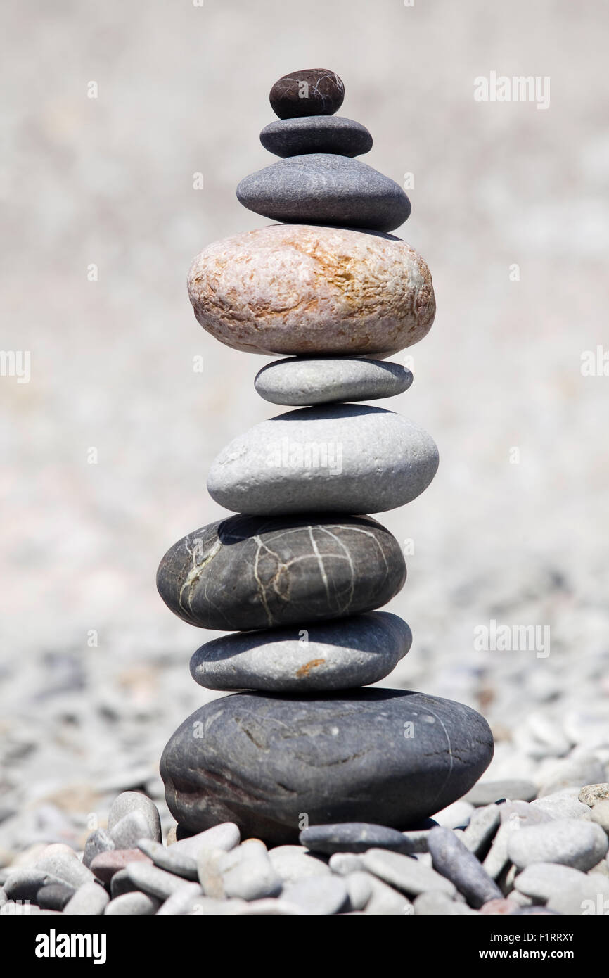 Pebble stacked on large stone hi-res stock photography and images - Alamy