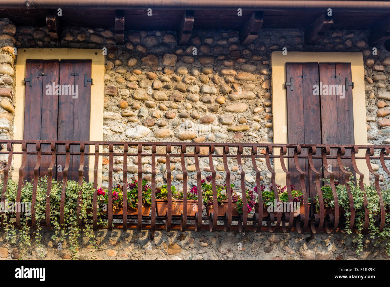 windows of ancient building of a typical Italian medieval village Stock ...