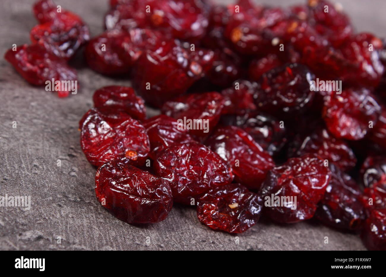 Heap of red cranberries on structure of concrete, concept for healthy ...