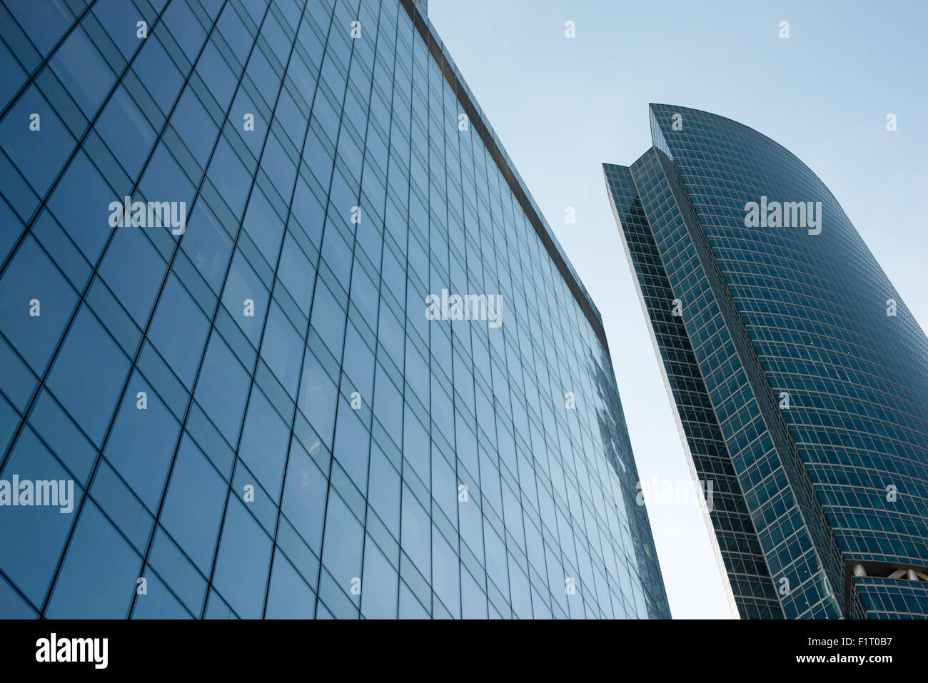High-rise buildings on blue sky, side view Stock Photo - Alamy