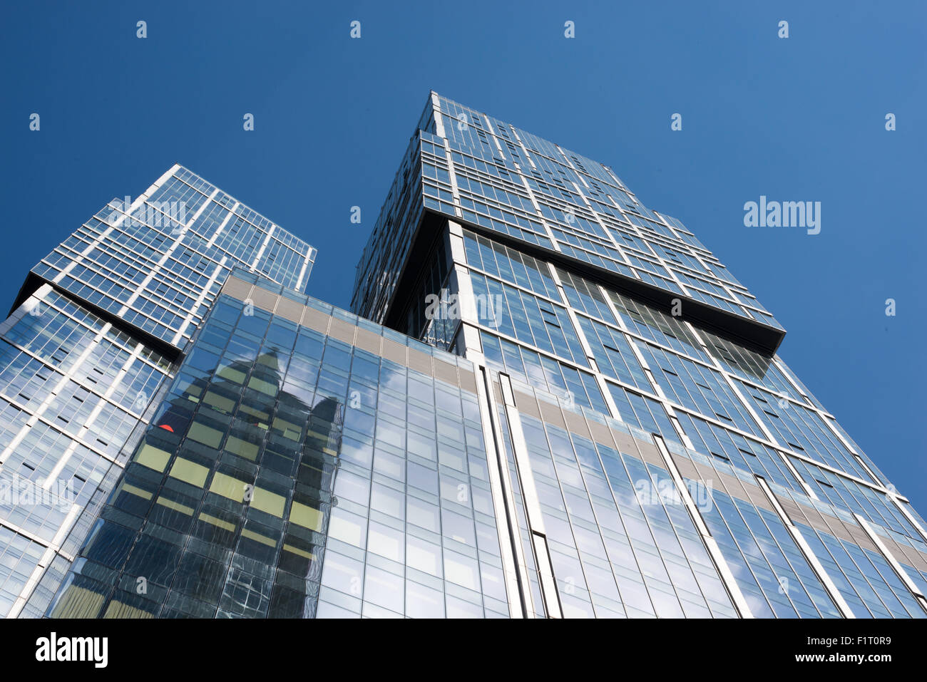 High-rise buildings on clear blue sky Stock Photo - Alamy