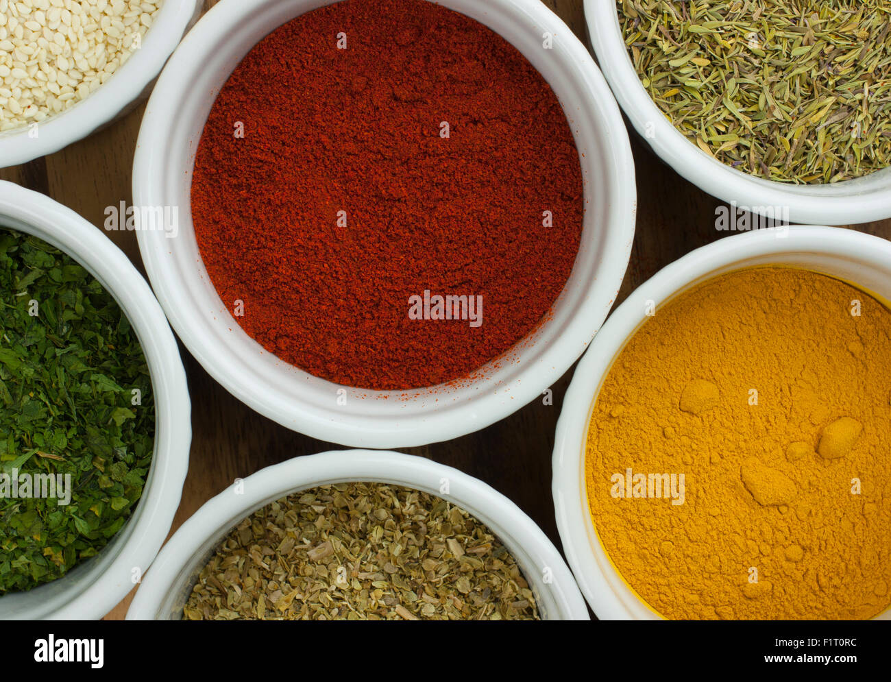 A group of colorful spices in ramekins Stock Photo - Alamy