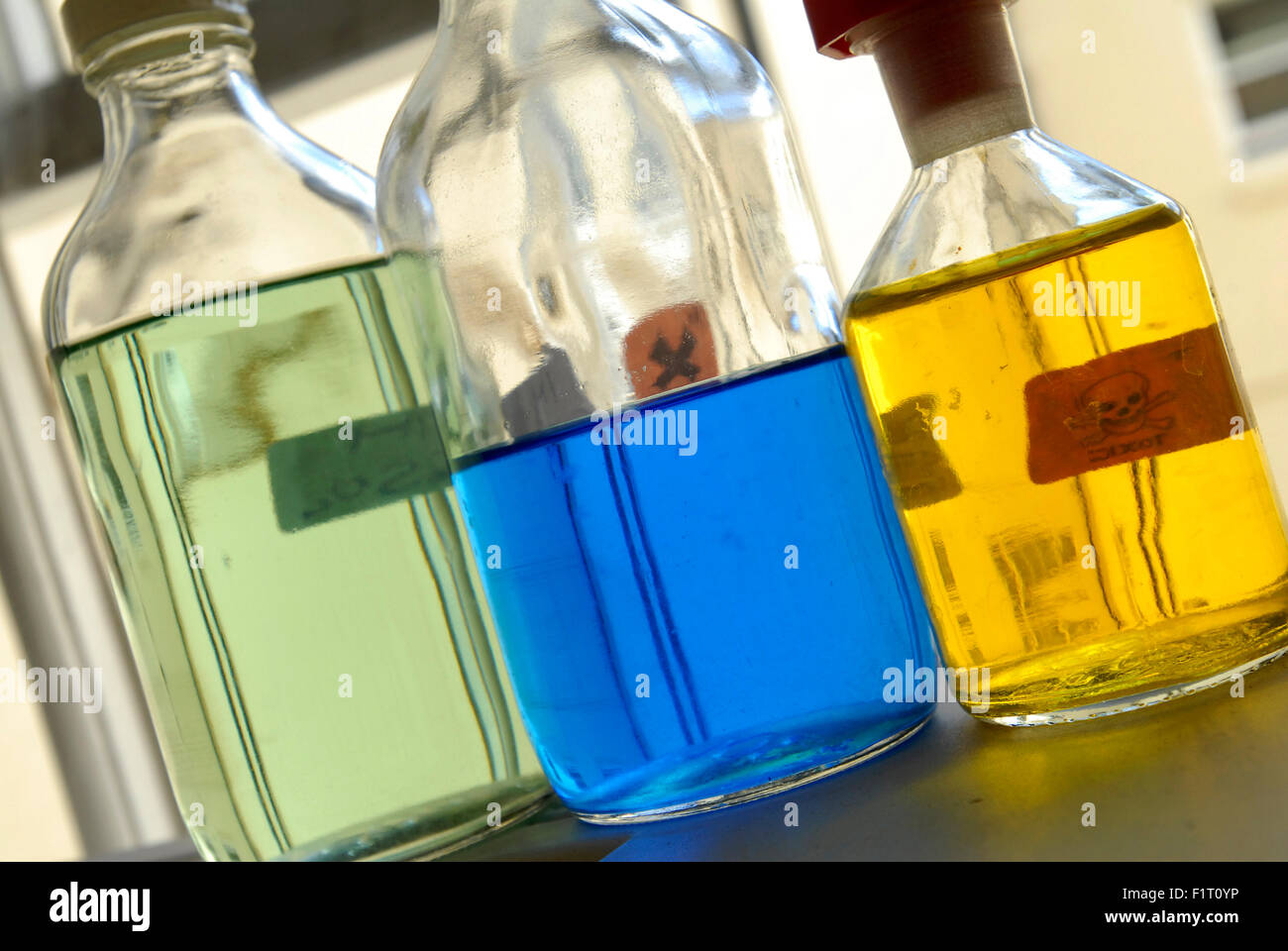 Chemical bottles in a school science laboratory Stock Photo - Alamy