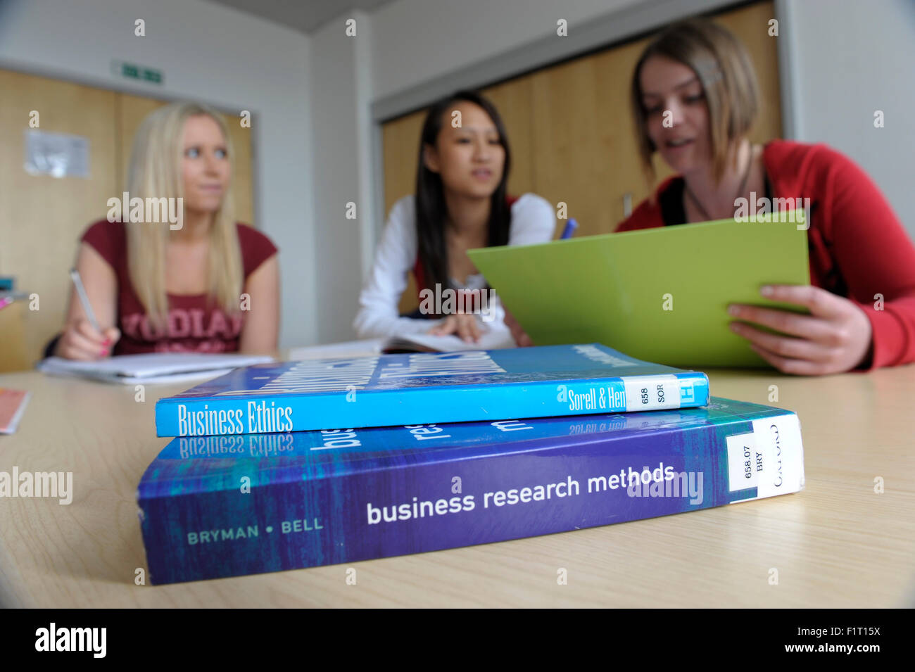 Business studies students in classroom Stock Photo - Alamy