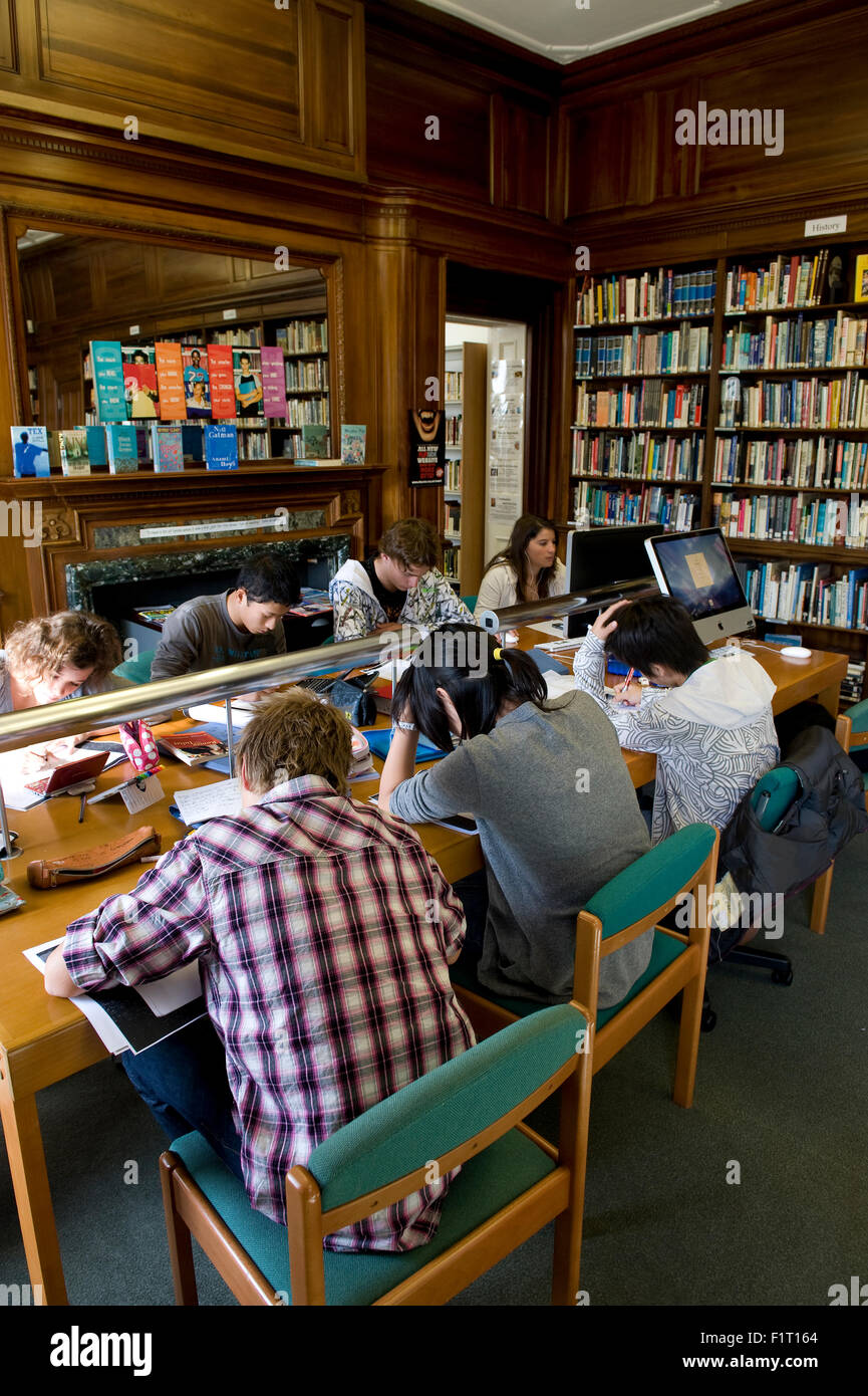 Students studying in a school library Stock Photo - Alamy