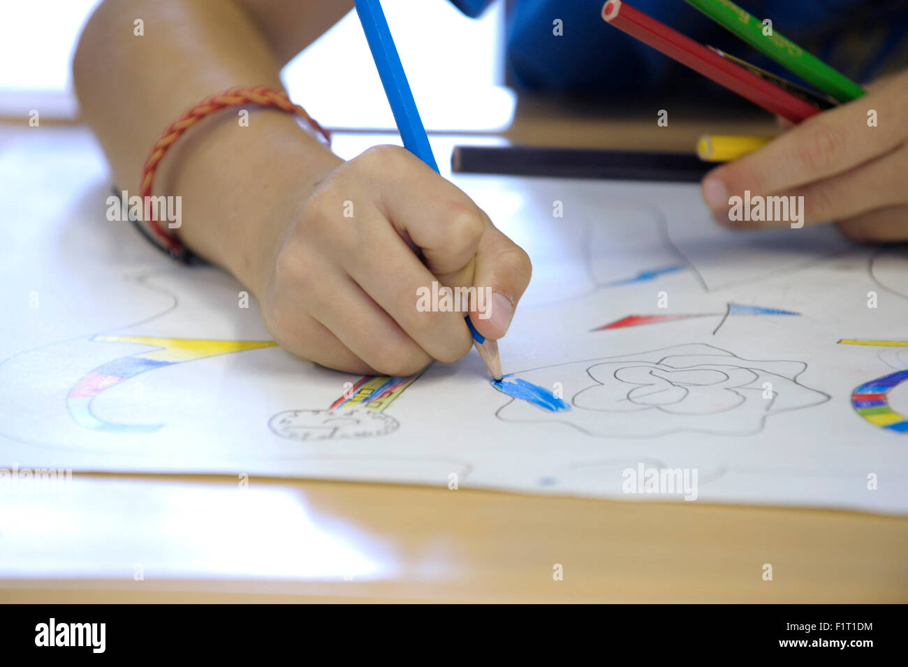 Children's hands writing, painting,sketching,colouring Stock Photo - Alamy