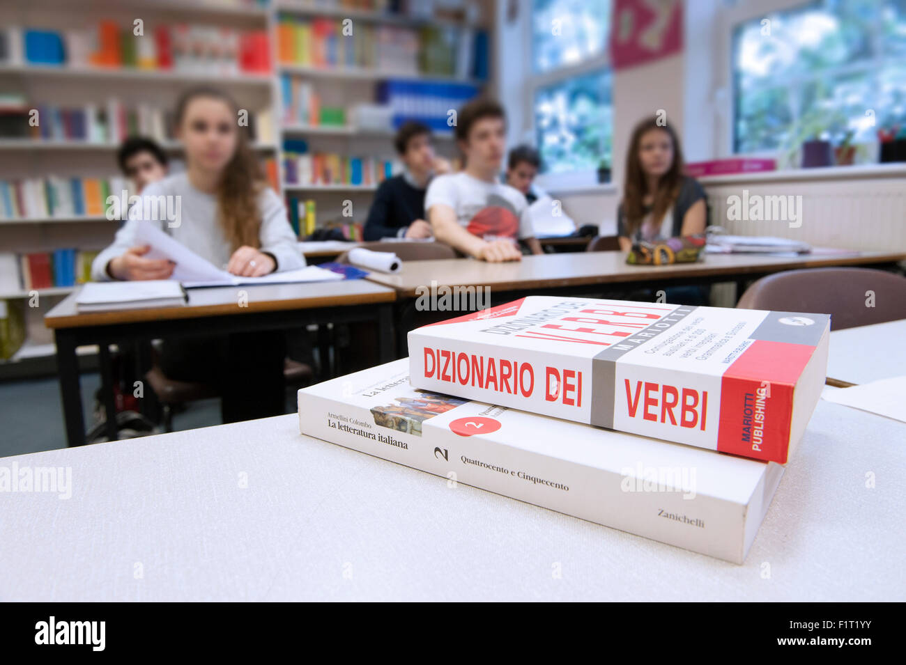 Italian school textbooks in a classroom with students Stock Photo - Alamy