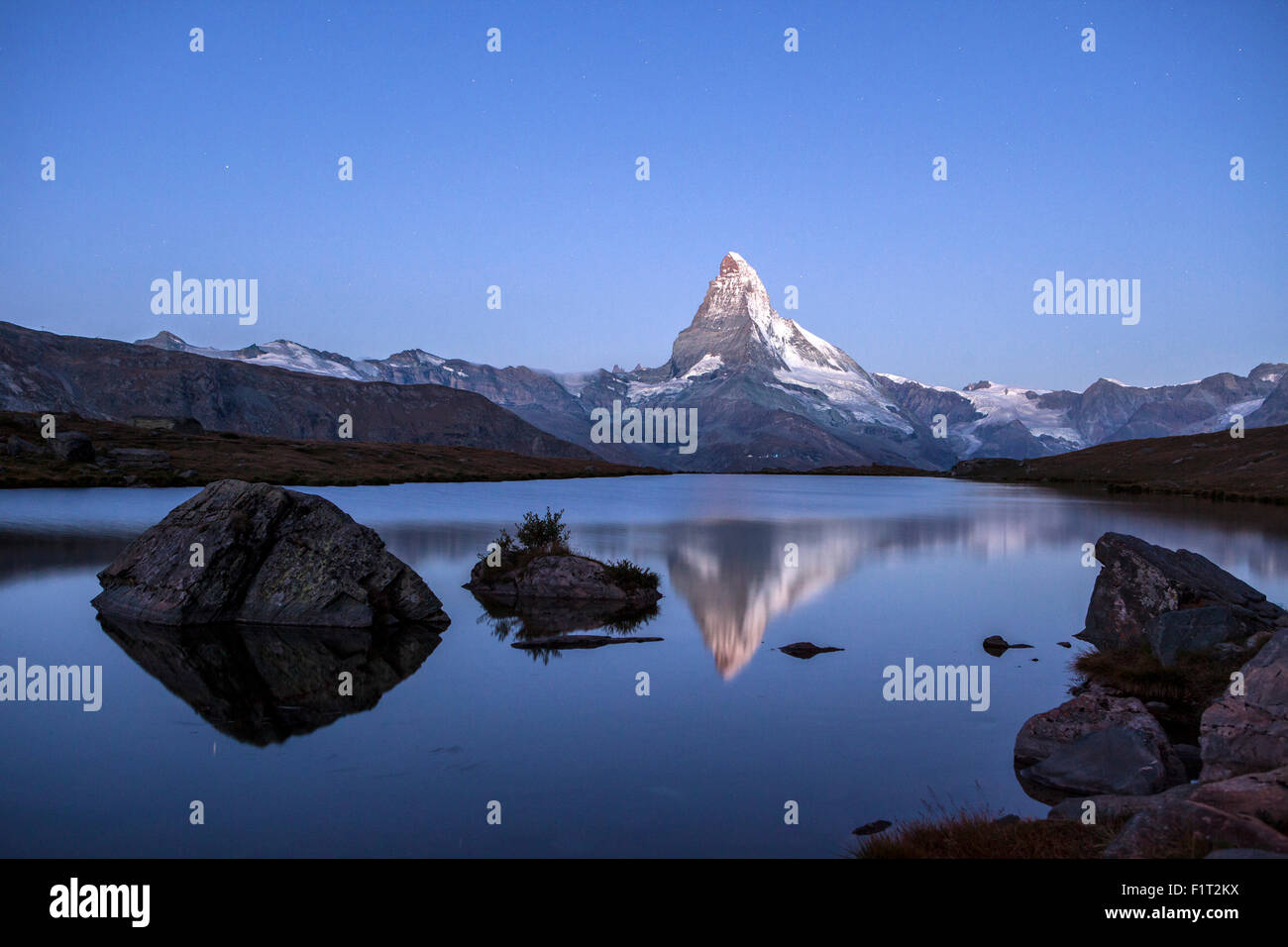 The Matterhorn reflected in Stellisee at sunrise, Zermatt, Canton of ...