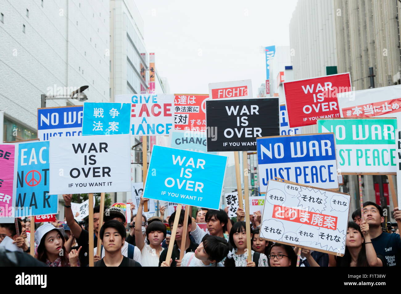 Protesters attend the rally against the government's controversial ...