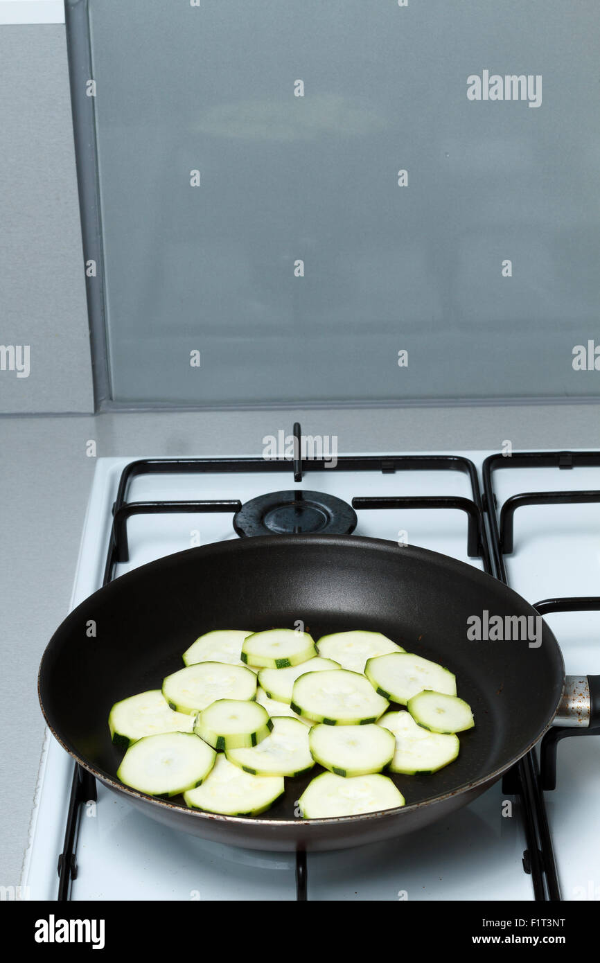 sliced courgette zucchini frying pan Stock Photo - Alamy