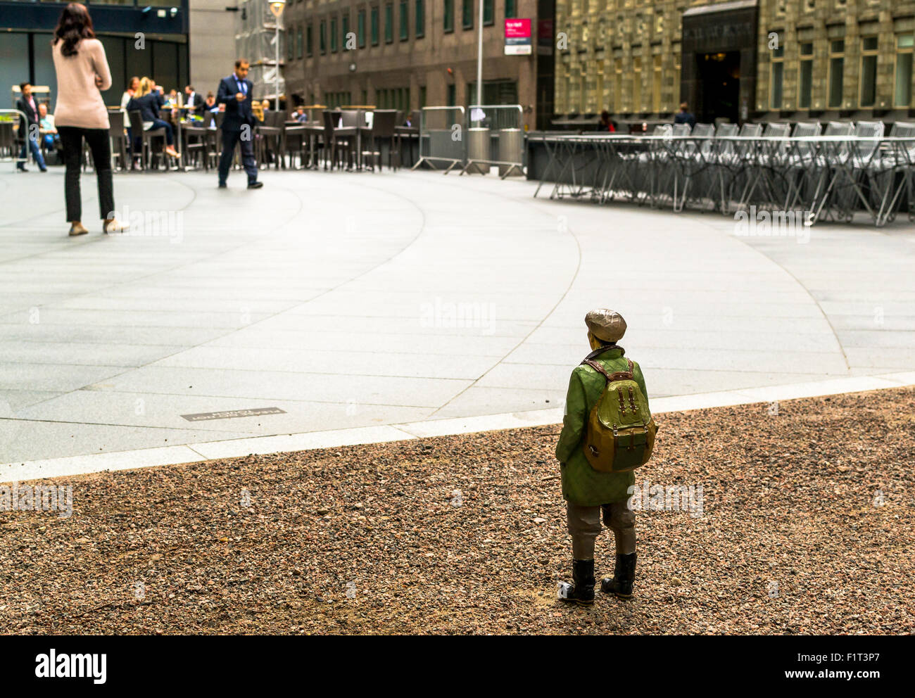 August 18th 2015 - Miniature human figure looks at city workers as part ...