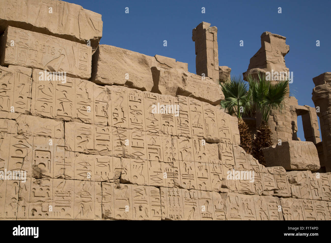 Hierogylphics on wall opposite Cachette Court, Karnak Temple, Luxor ...