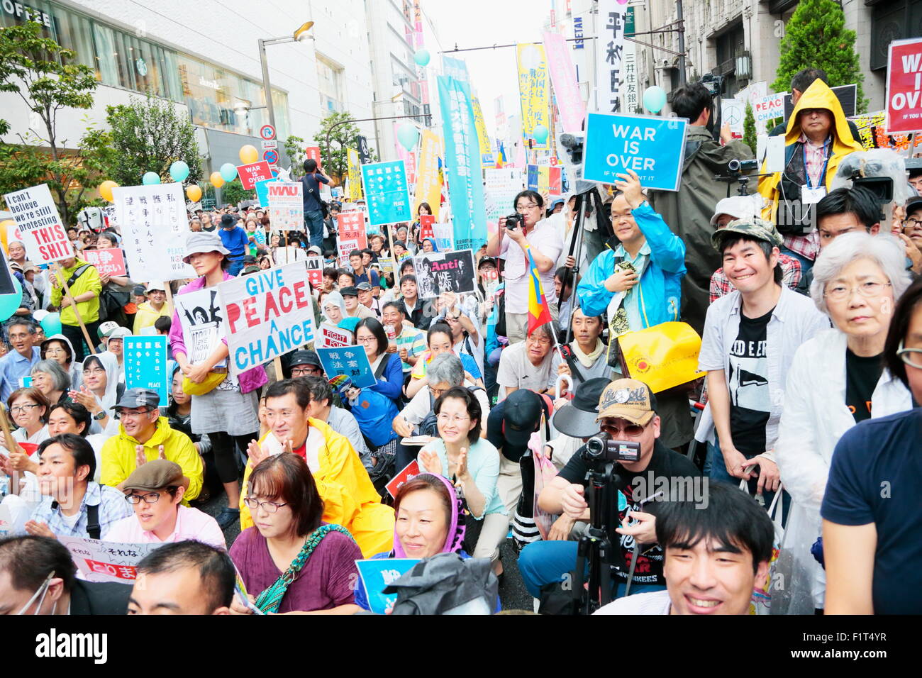 Protesters attend the rally against the government's controversial ...