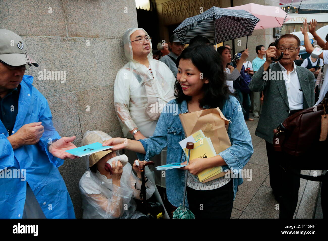 Protesters attend the rally against the government's controversial ...