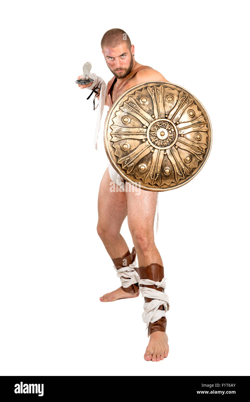 Gladiator posing with shield and sword isolated in white Stock Photo ...