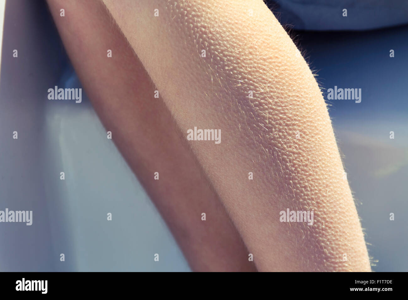 child having goosebumps sitting in a boat, close up Stock Photo - Alamy