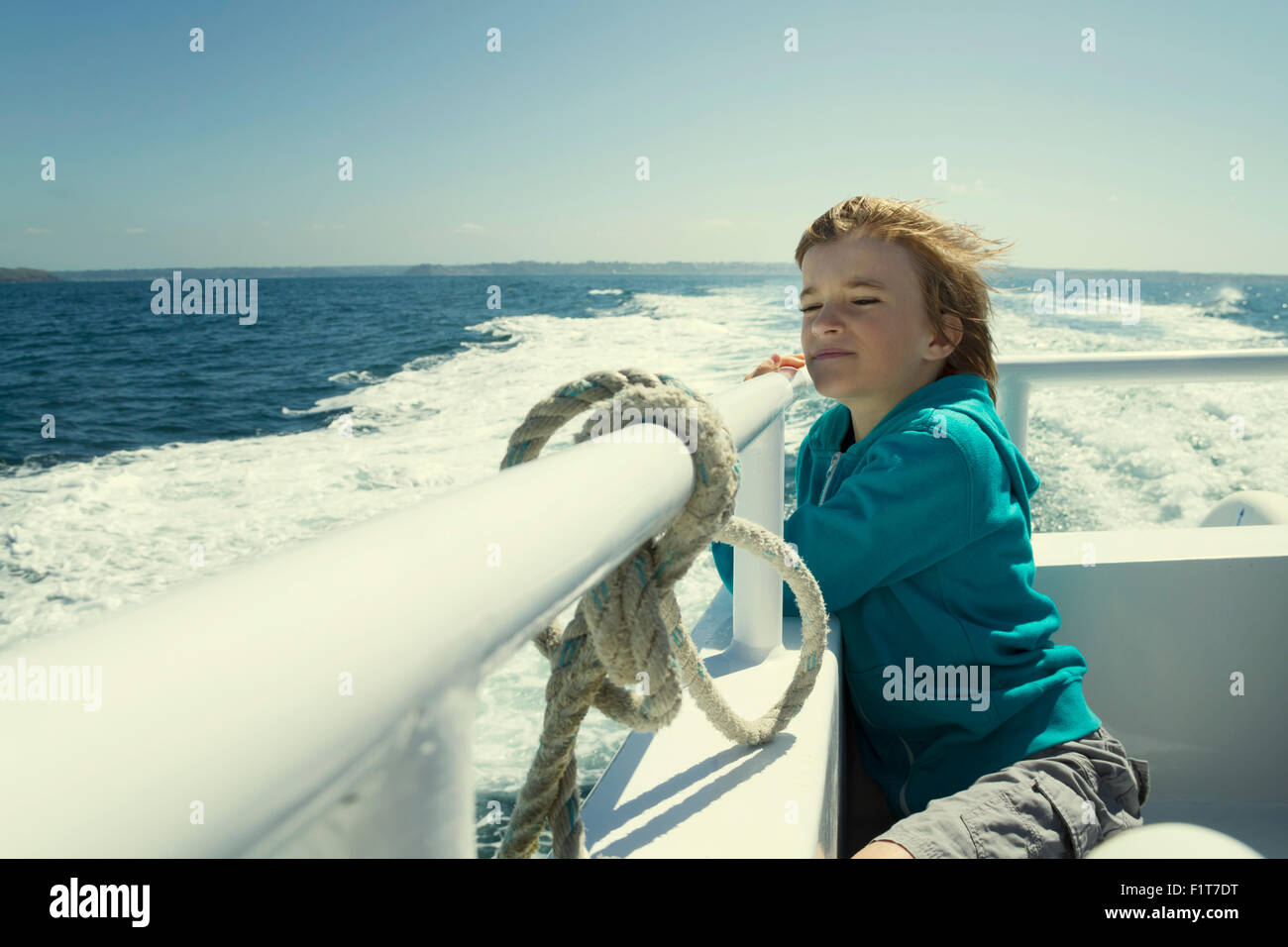 boy caucasian in a boat Stock Photo - Alamy
