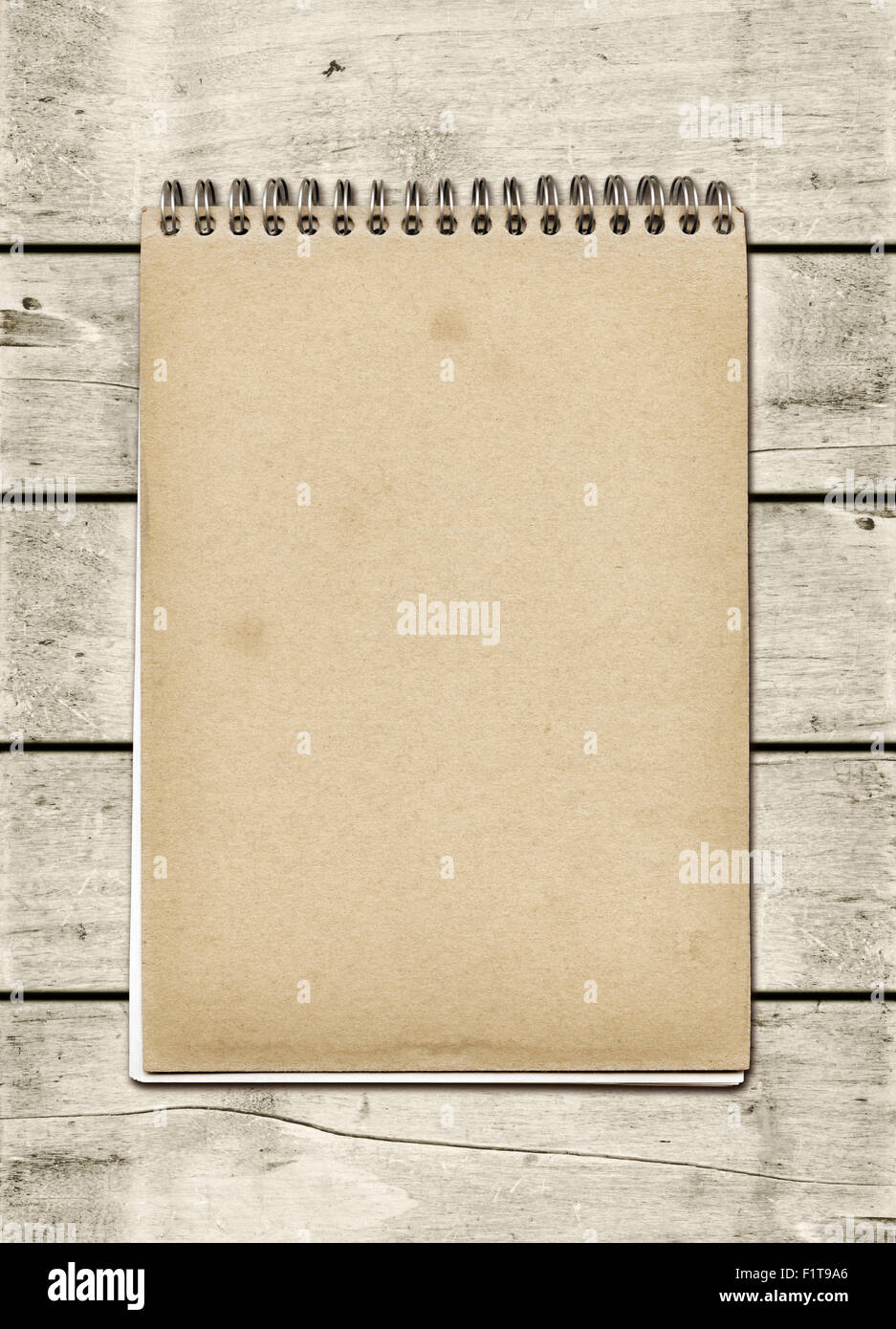 Closed spiral Note book on a white wood table. Mockup Stock Photo - Alamy