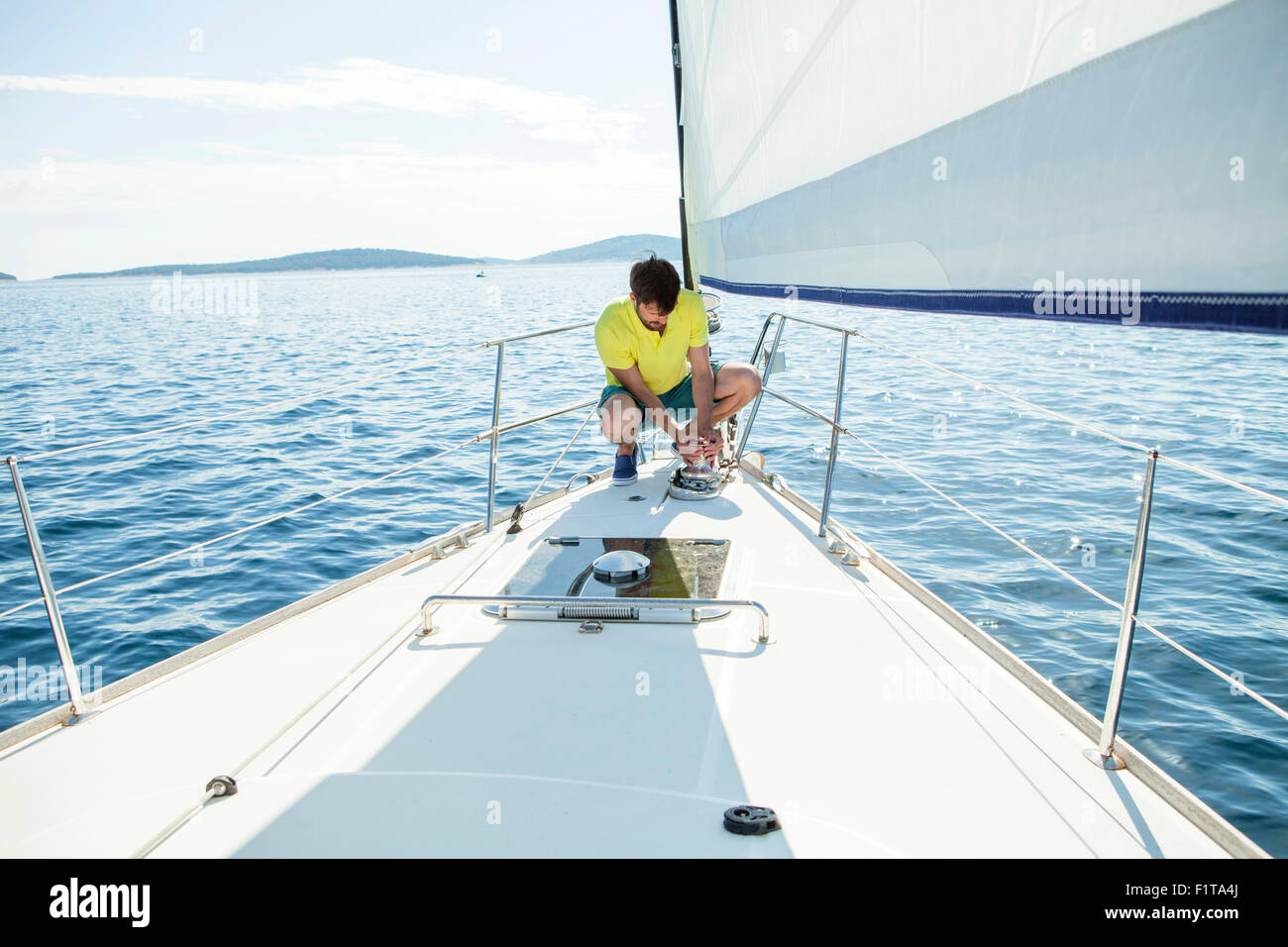 Adjusting sail hi-res stock photography and images - Alamy