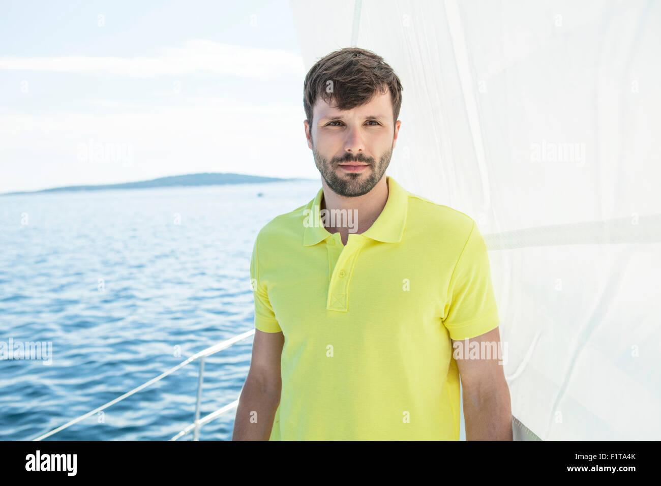 Man on sailboat hi-res stock photography and images - Alamy