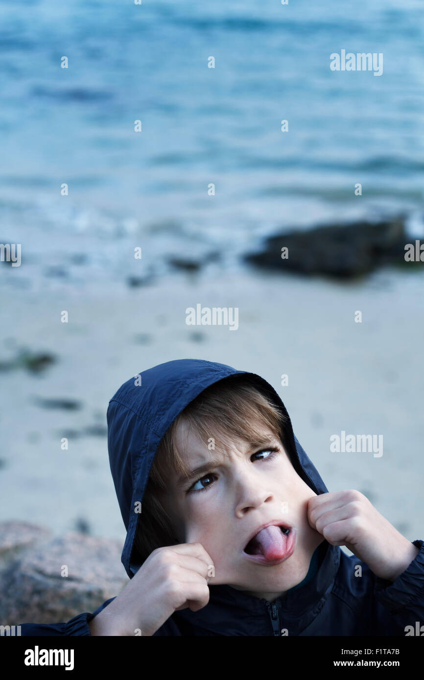 boy caucasian pulling a face Stock Photo - Alamy