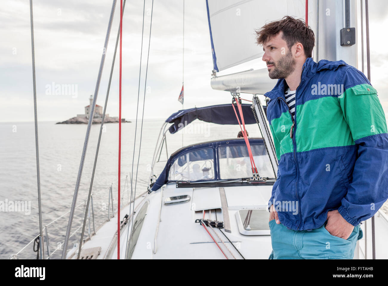 Man overlooking sea from sailboat, Adriatic Sea Stock Photo - Alamy