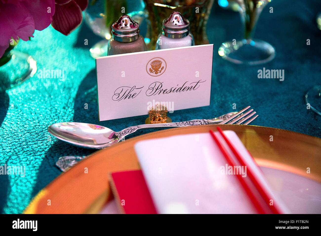U.S. President Barack Obama's place is set at the table prior to the ...