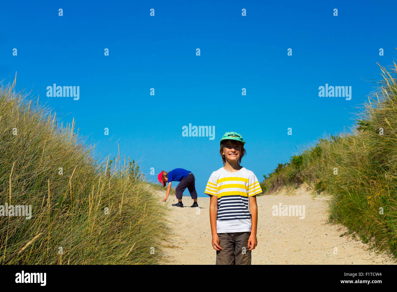 boys brothers sand beach Stock Photo - Alamy