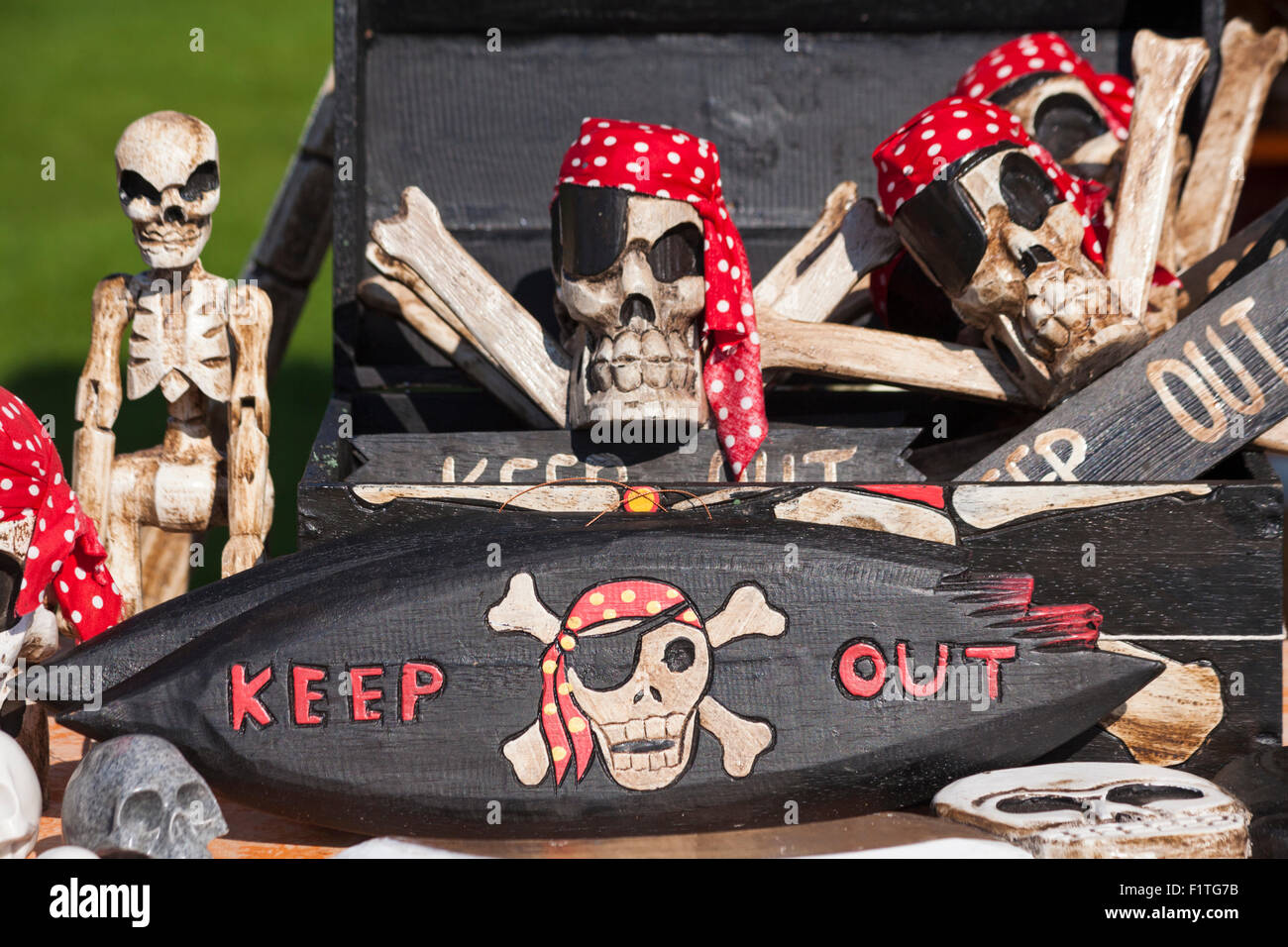 Keep out sign and skull & crossbones for sale on stall at Poole Thai ...