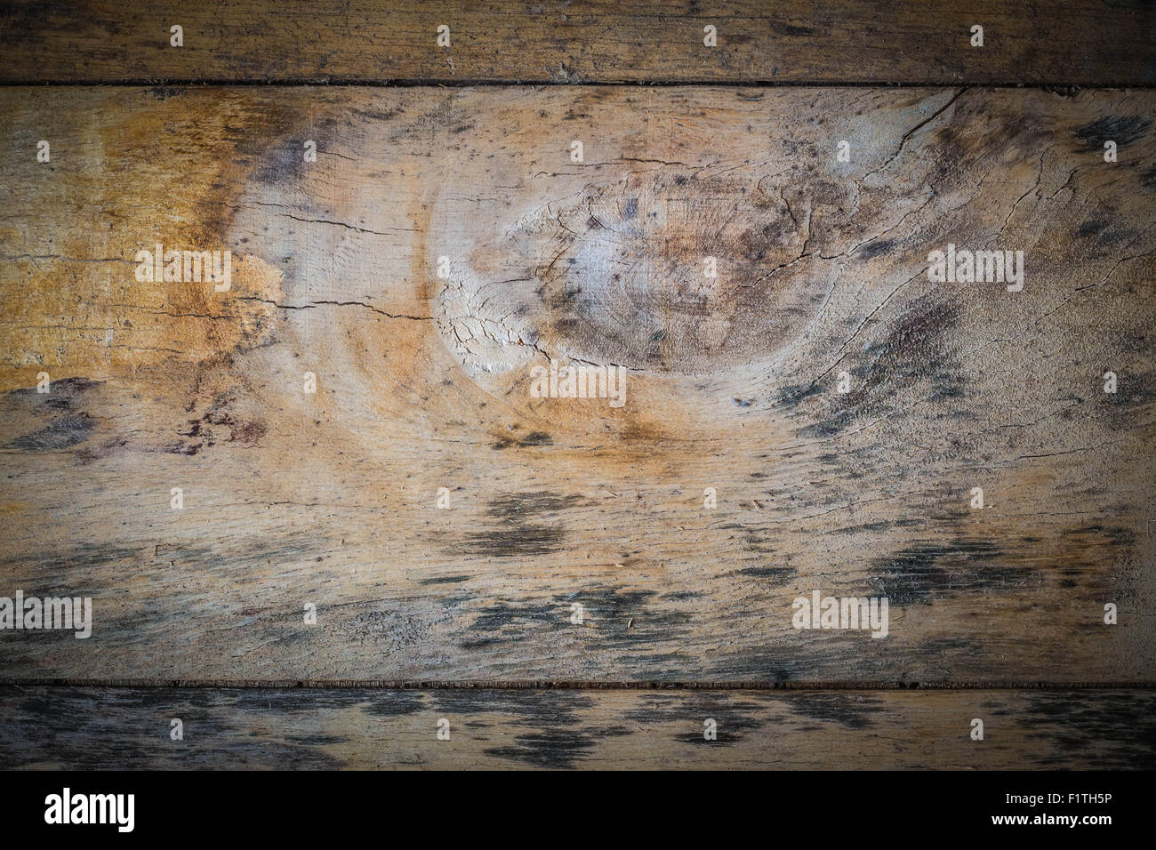 Background old wooden plate with black from mold and cracks of wood ...