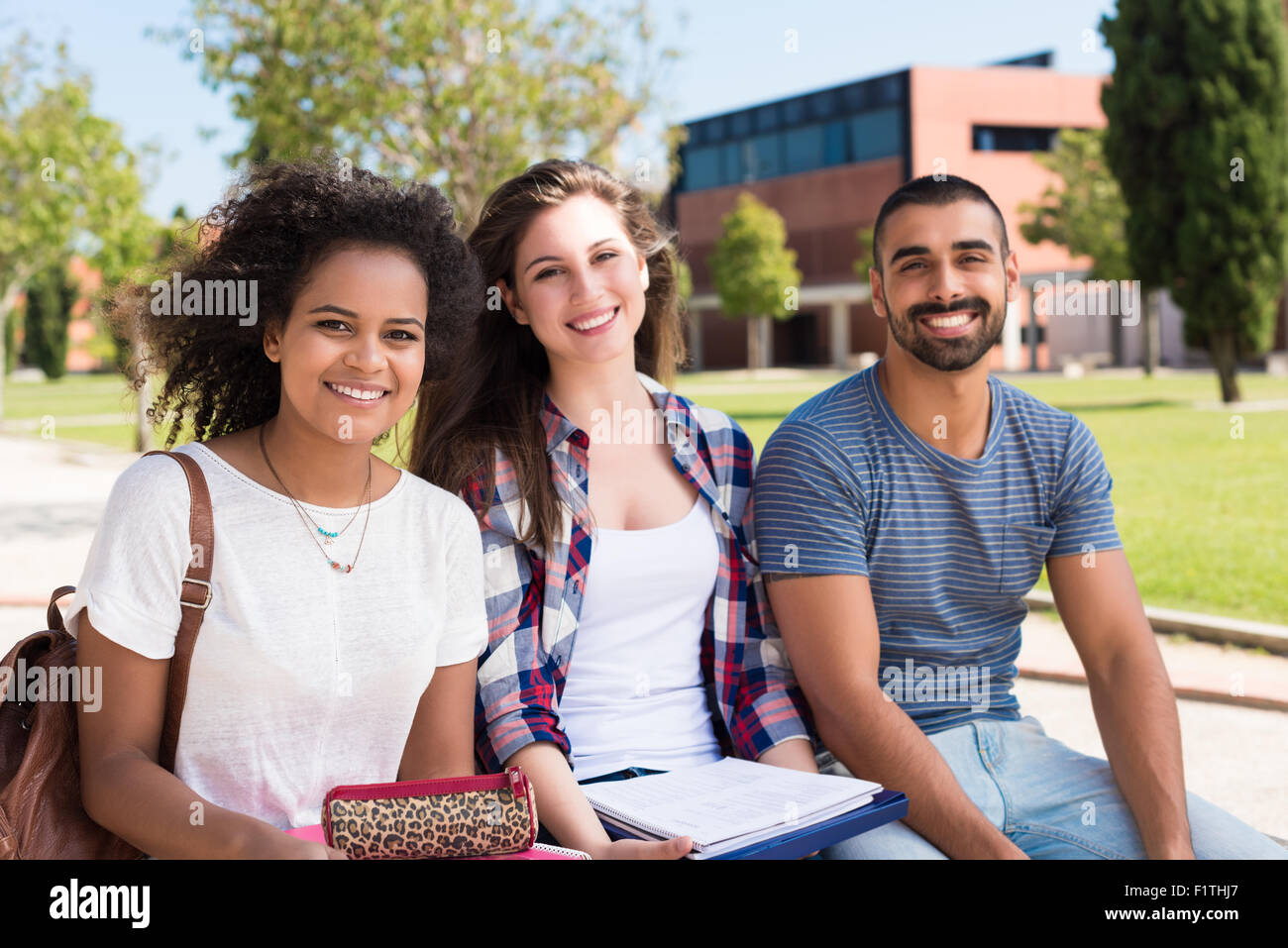 Multi-Ethnic group of students in School Campus Stock Photo - Alamy