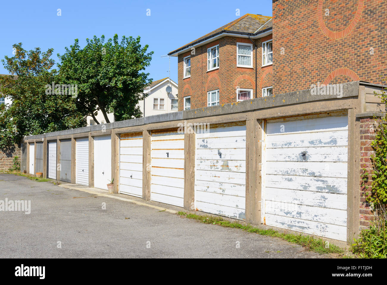 Row of private car garages in England, UK Stock Photo - Alamy