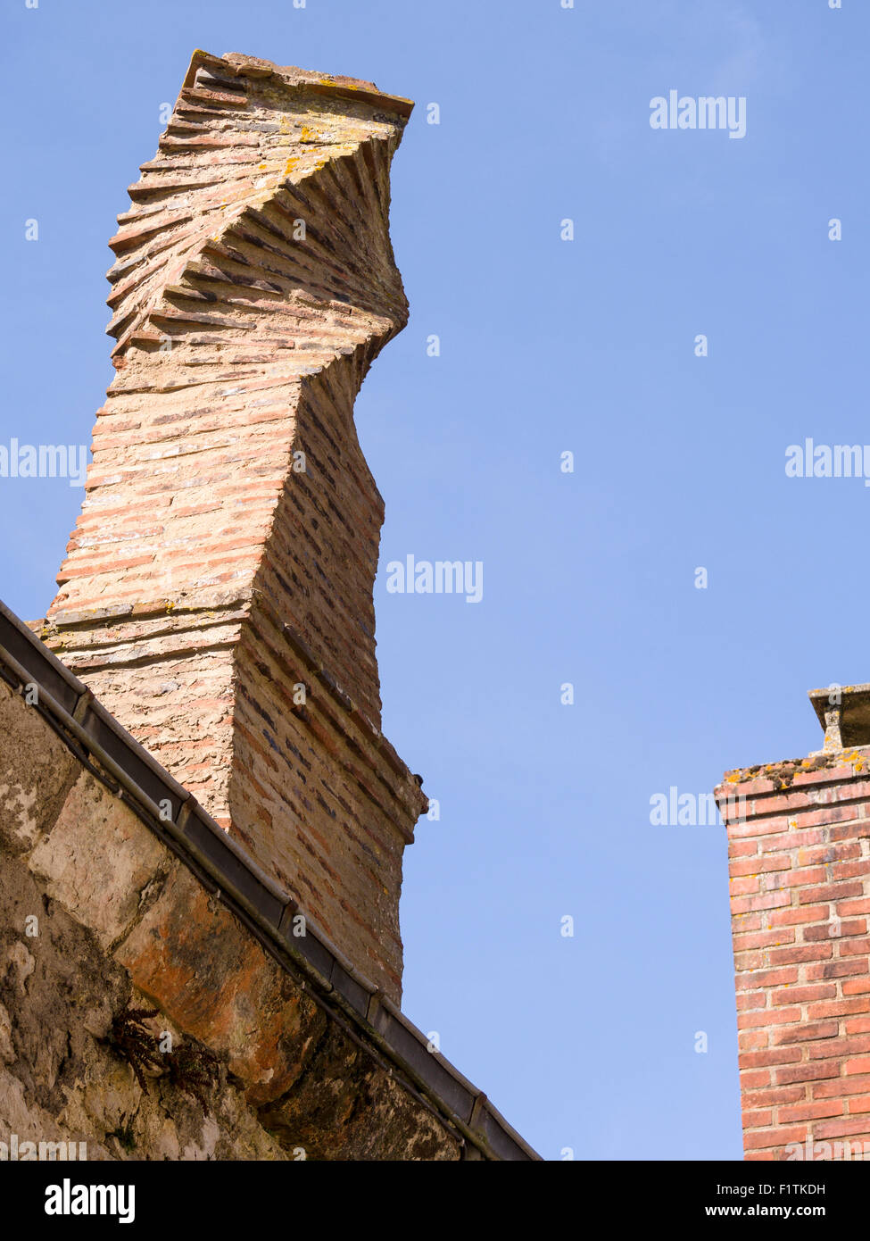 Twisted Chimney. A twisted chimney in roman brick tops a house in this ...