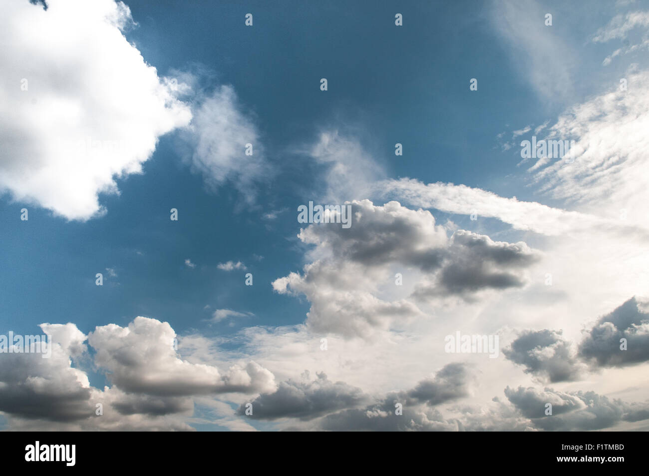 white cloudscape in dark blue sky Stock Photo - Alamy
