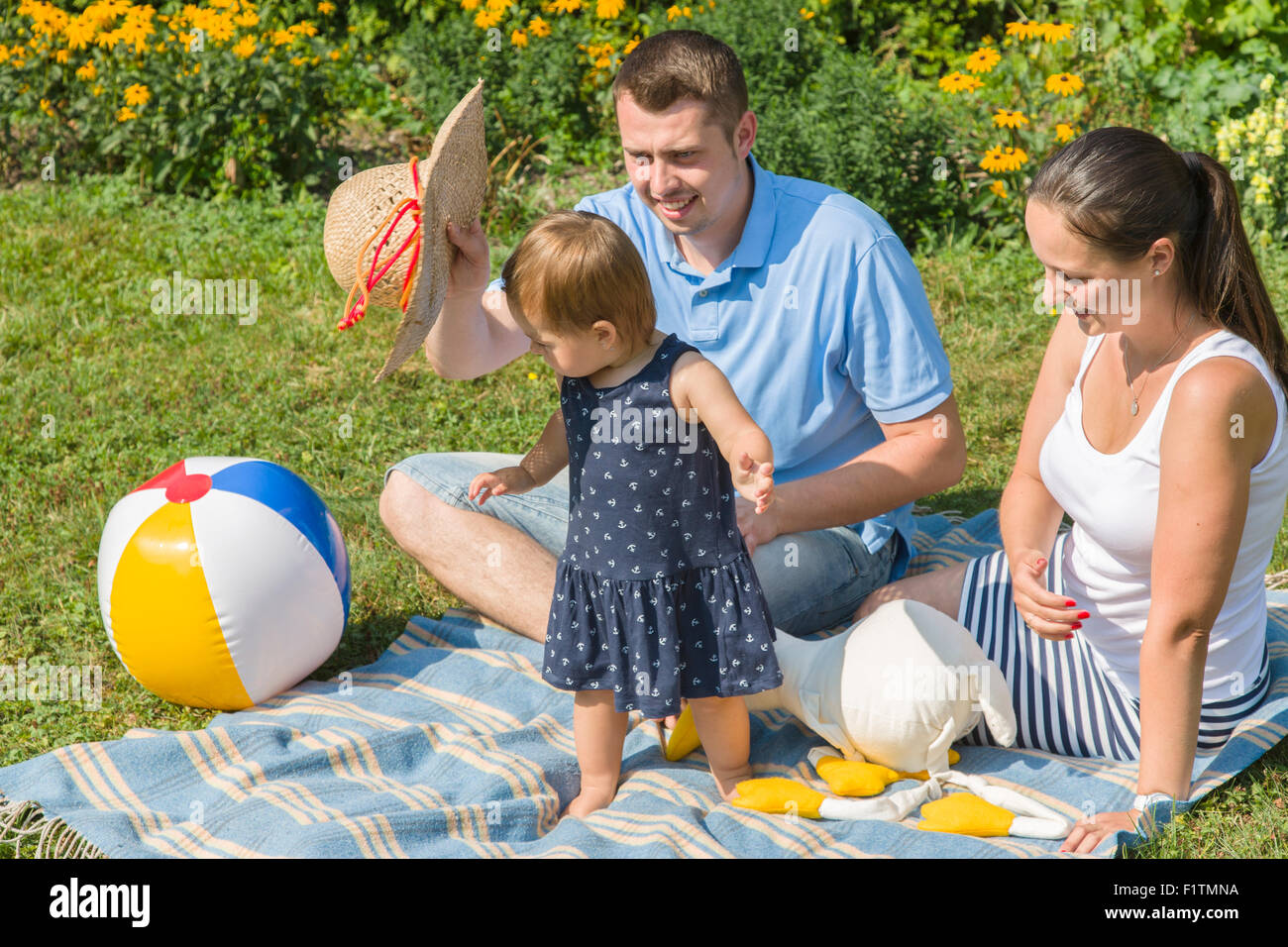 Happy family with child Stock Photo - Alamy