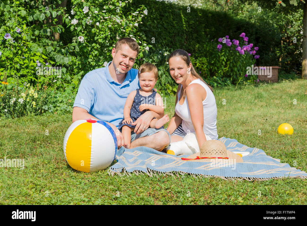 Happy family with child Stock Photo - Alamy