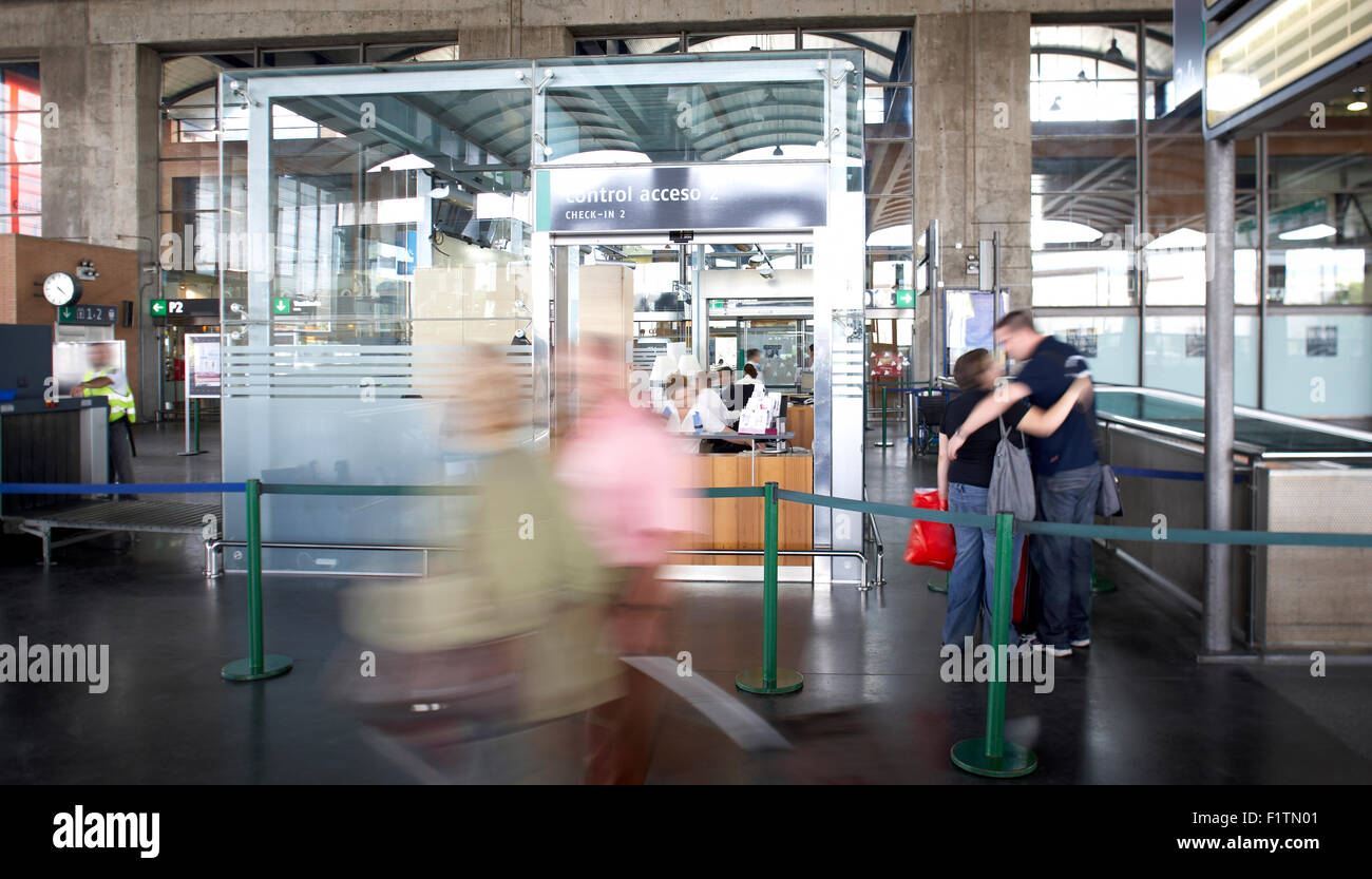 Boarding area at railway station with people horizontal Stock Photo - Alamy