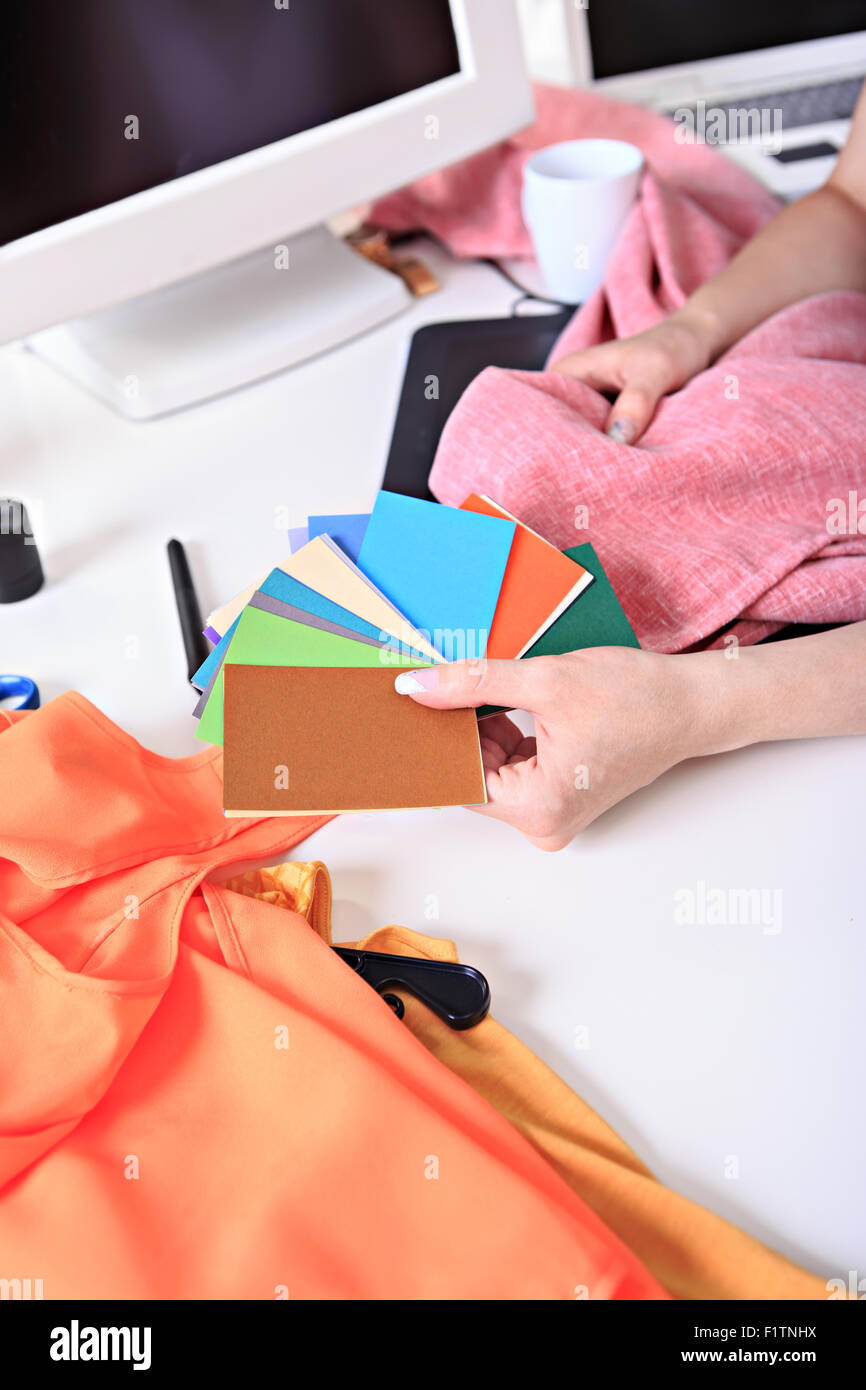 female fashion designer in the office at work Stock Photo - Alamy