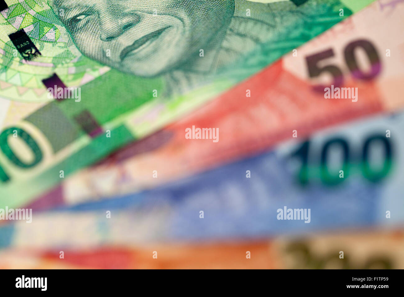 The portrait of Nelson Mandela on a selection of South African bank ...