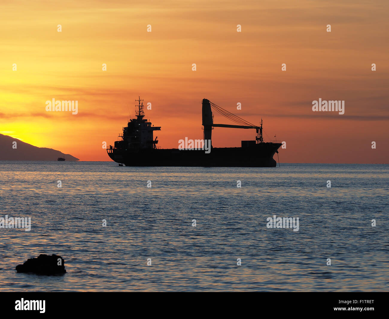 Sunset on flores island, bali, indonesia Stock Photo - Alamy