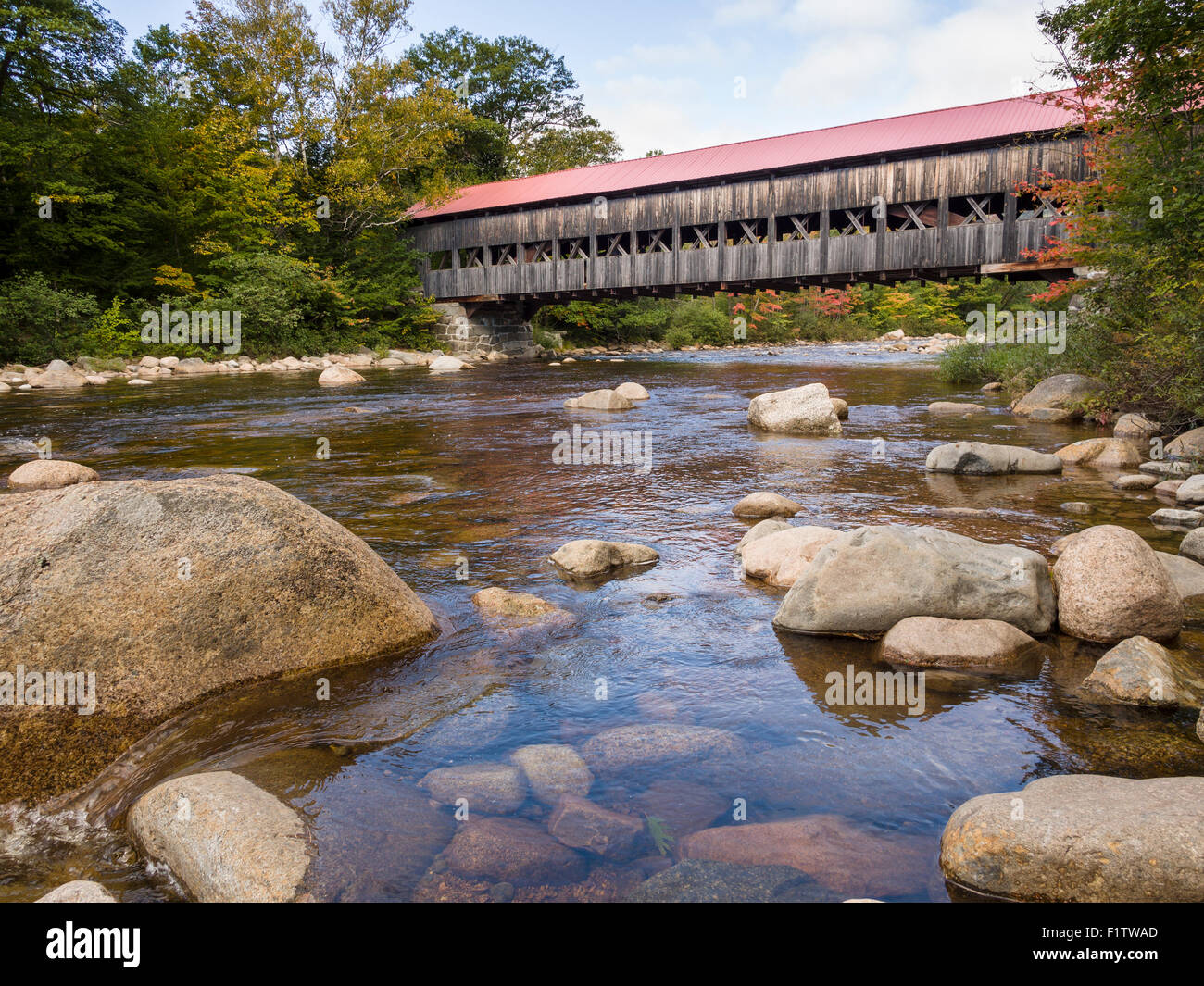 Covered bridge with stream and forest hi-res stock photography and ...