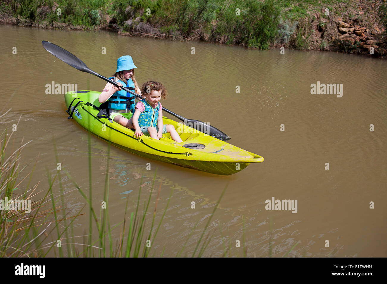 Girls paddling hi-res stock photography and images - Alamy