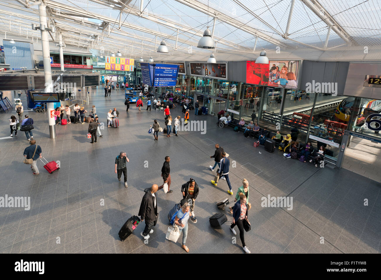 The inside foyer of Manchester Piccadilly railway train station on a ...