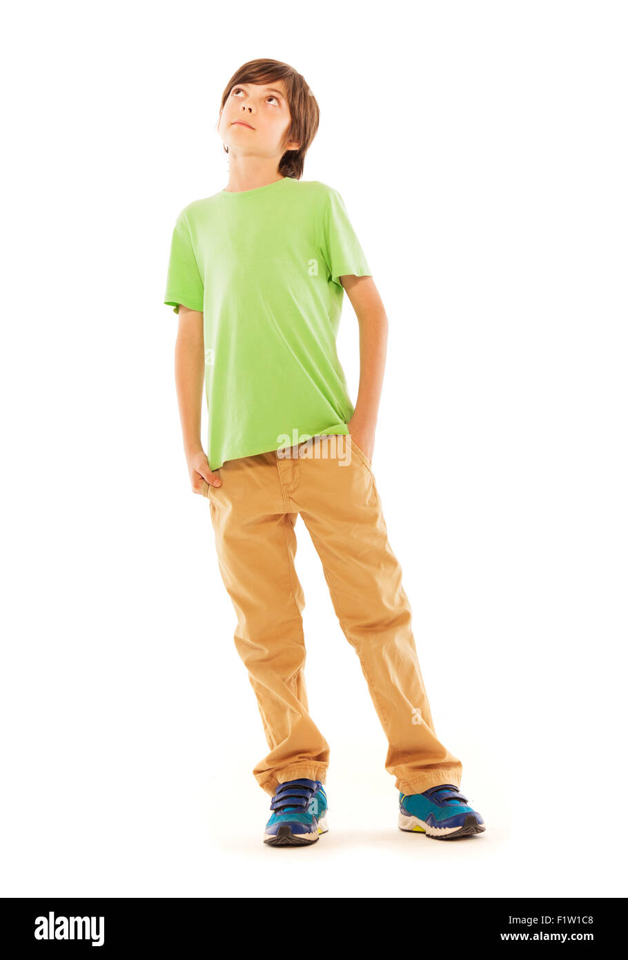 Dreaming boy stand and look up thoughtful Stock Photo - Alamy