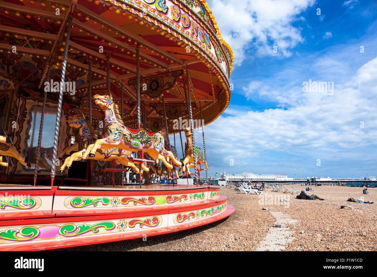 Carousel on the beach in Brighton, UK Stock Photo - Alamy