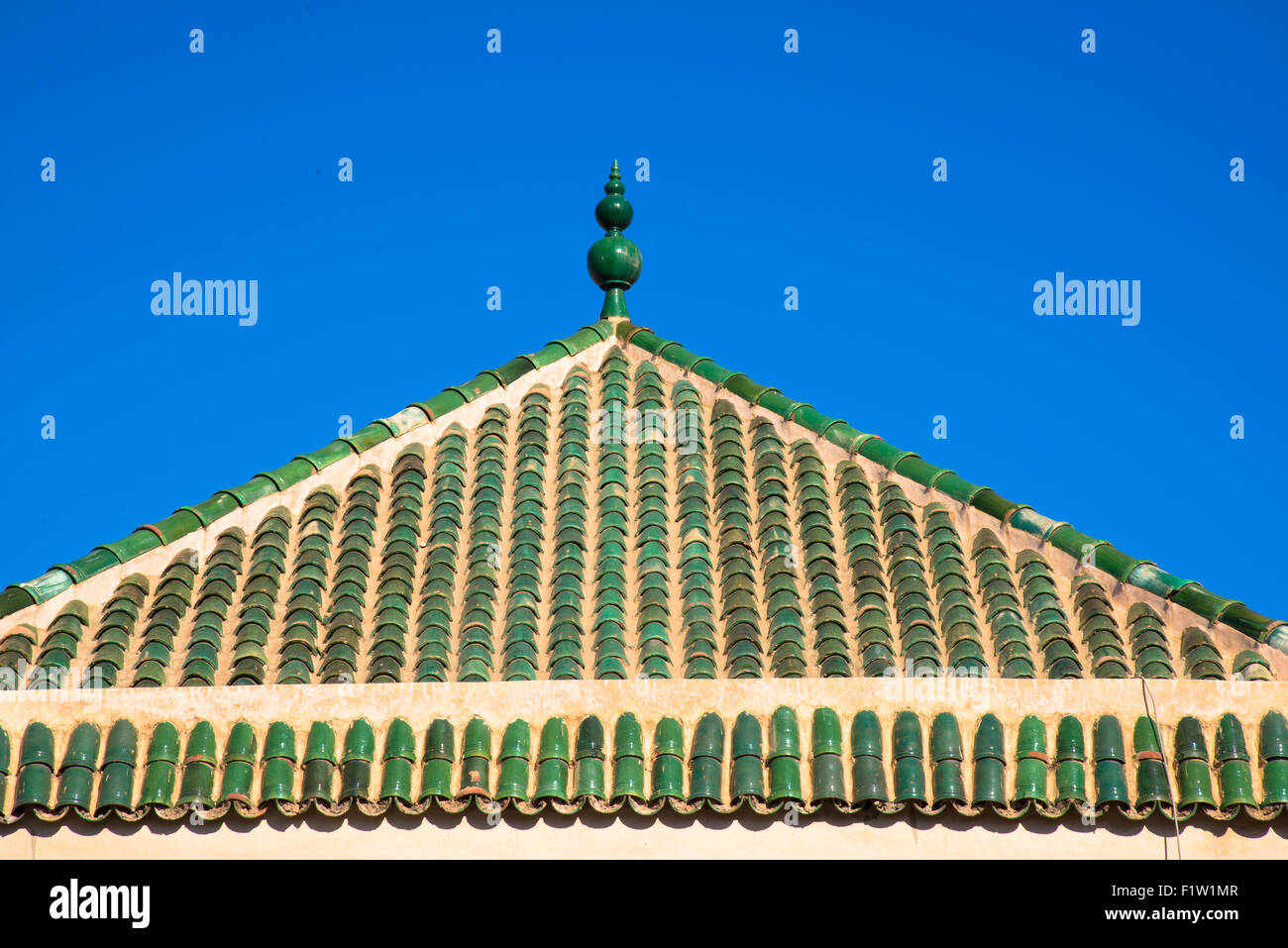 roof with green tiles in marrakech maroc and blue sky Stock Photo - Alamy
