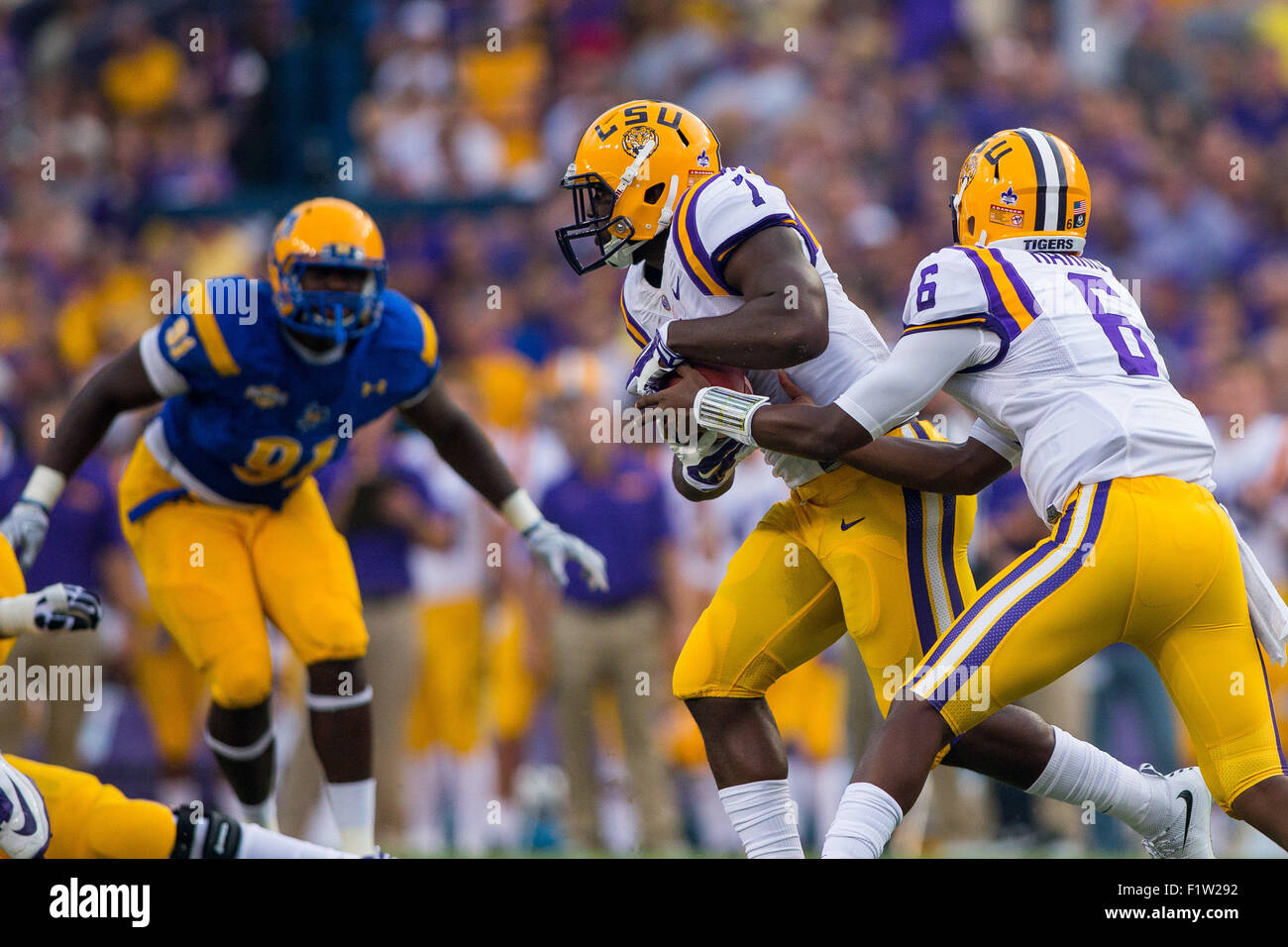 Delay. 5th Sep, 2015. LSU Tigers quarterback Brandon Harris (6) hands ...
