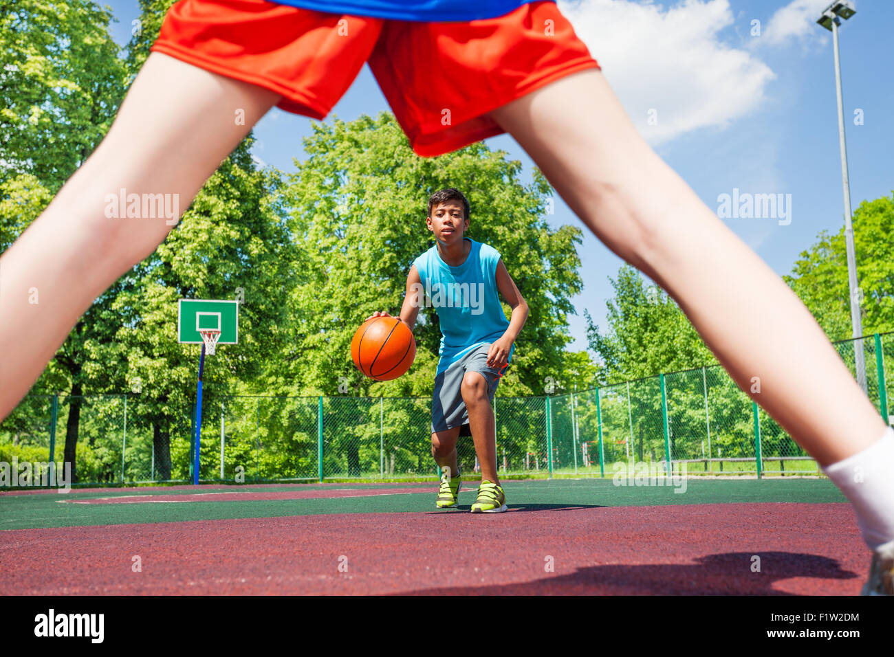 Hands between legs hi-res stock photography and images - Alamy